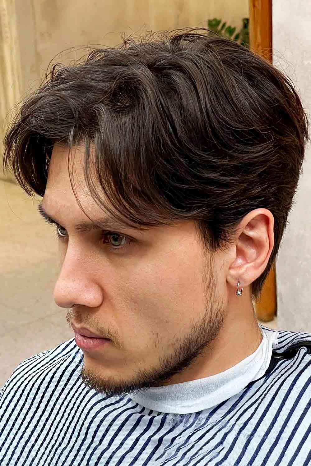 25 Middle Part Hairstyles For Men To Rock